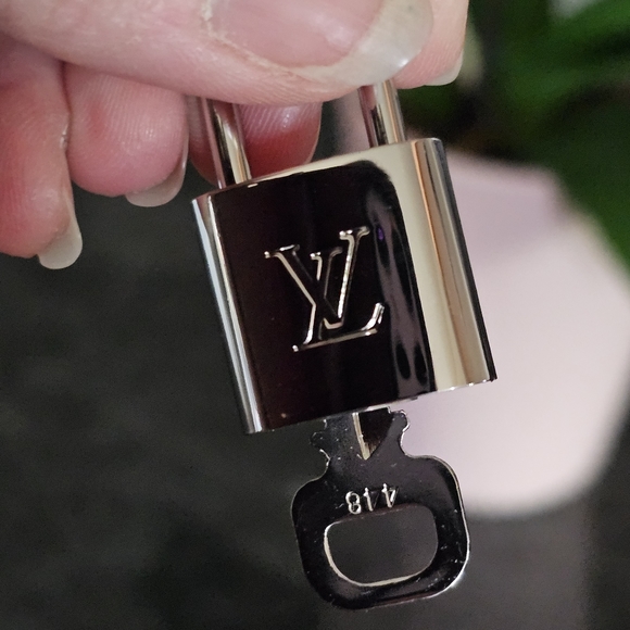 Louis Vuitton | Bags | Louis Vuitton Silver Lock Key 448 | Poshmark